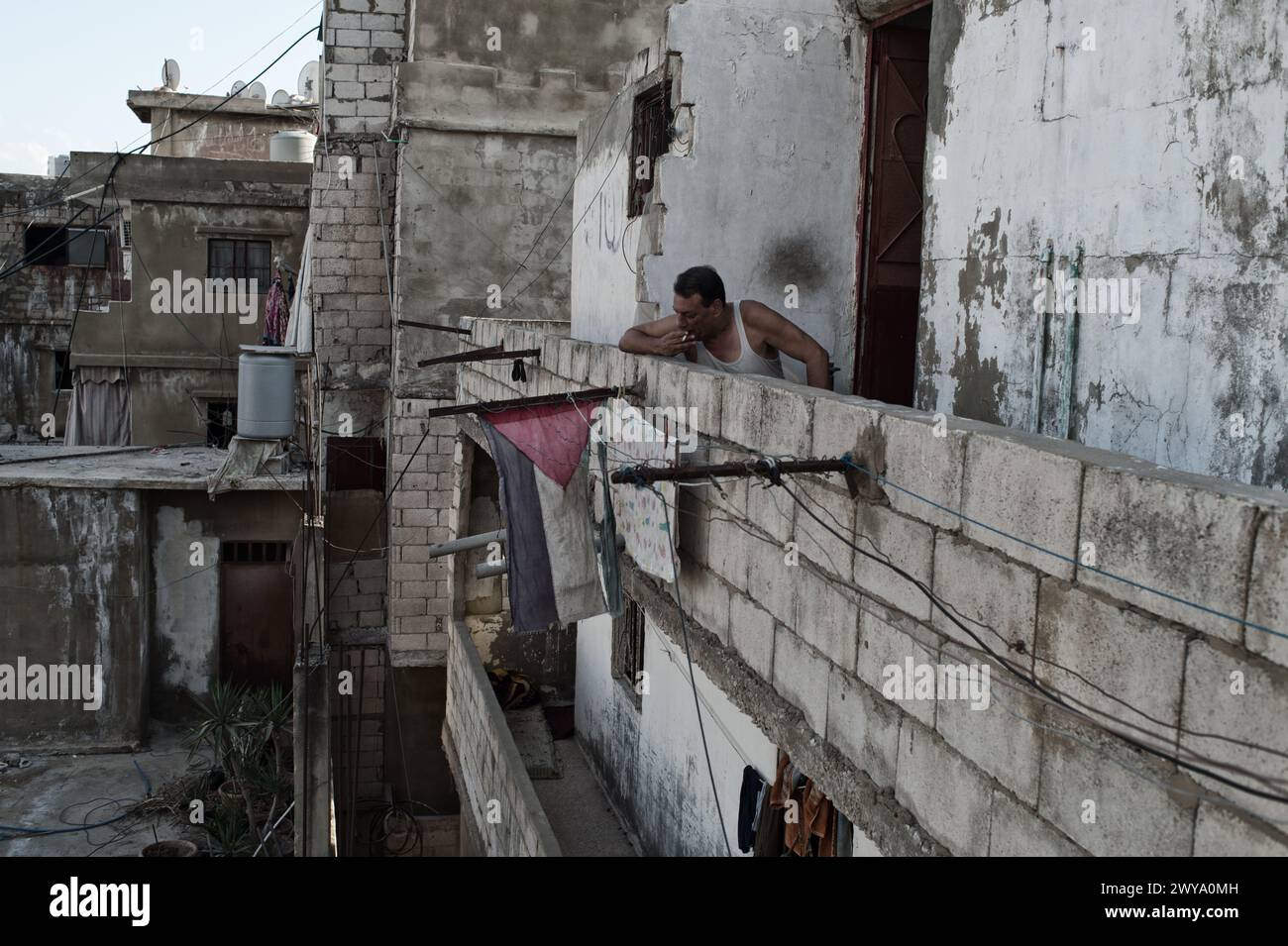 Photograph of Palestinian and his flag in the Sabra-Shatila Refugee ...