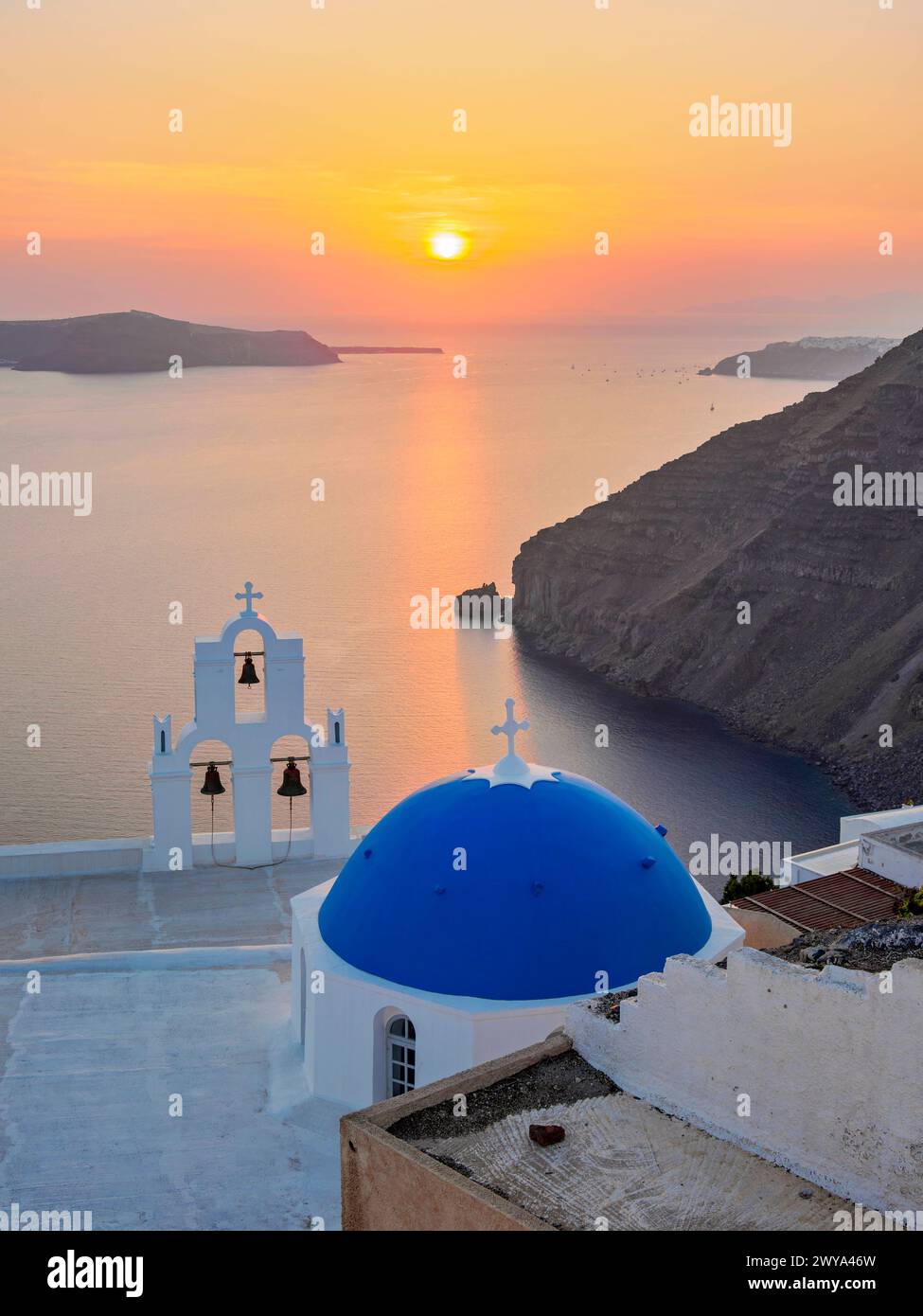 Three Bells of Fira, iconic blue domed church at sunset, Fira ...