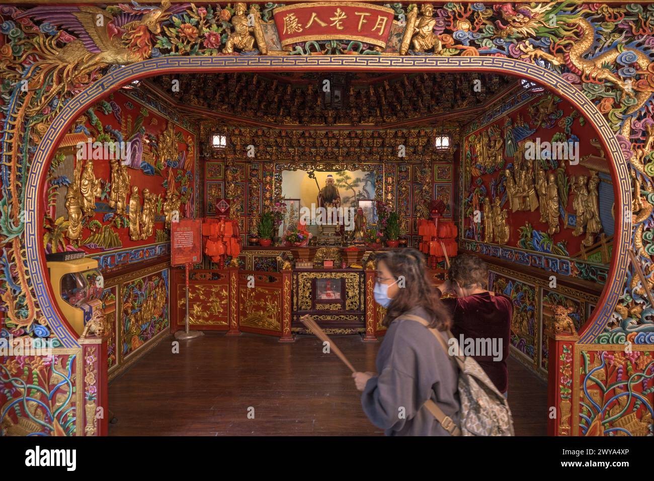 Devotees with incense offerings praying in Mazu temple Stock Photo - Alamy