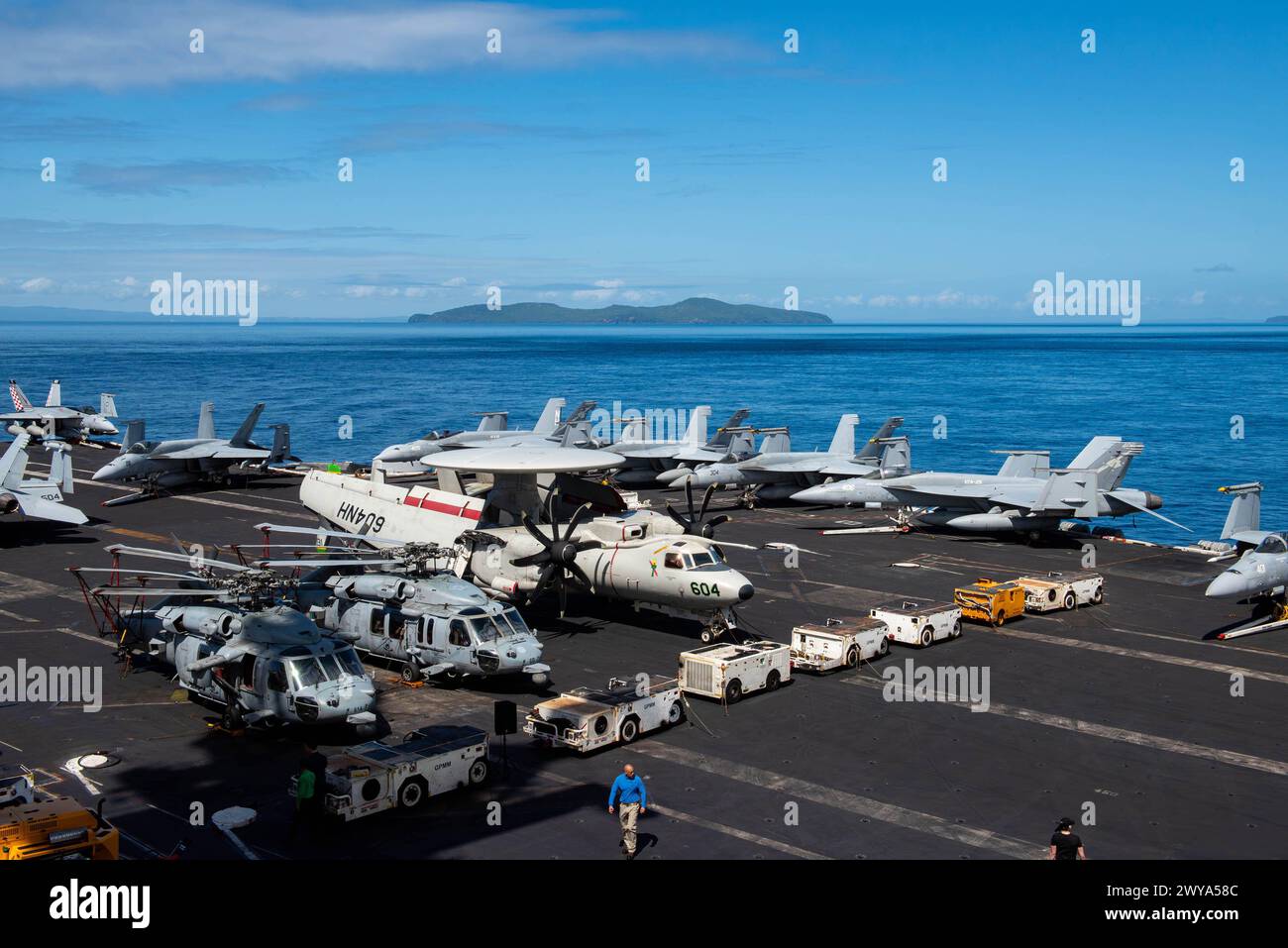 SAN BERNARDINO STRAIT (April 2, 2024) The Nimitz-class aircraft carrier USS Theodore Roosevelt ...