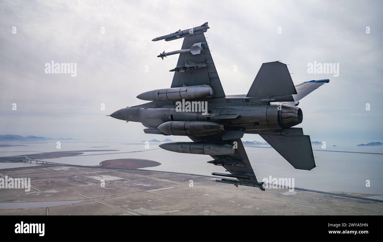 Two F-16 Fighting Falcons from the 35th Fighter Squadron, fly over the ...