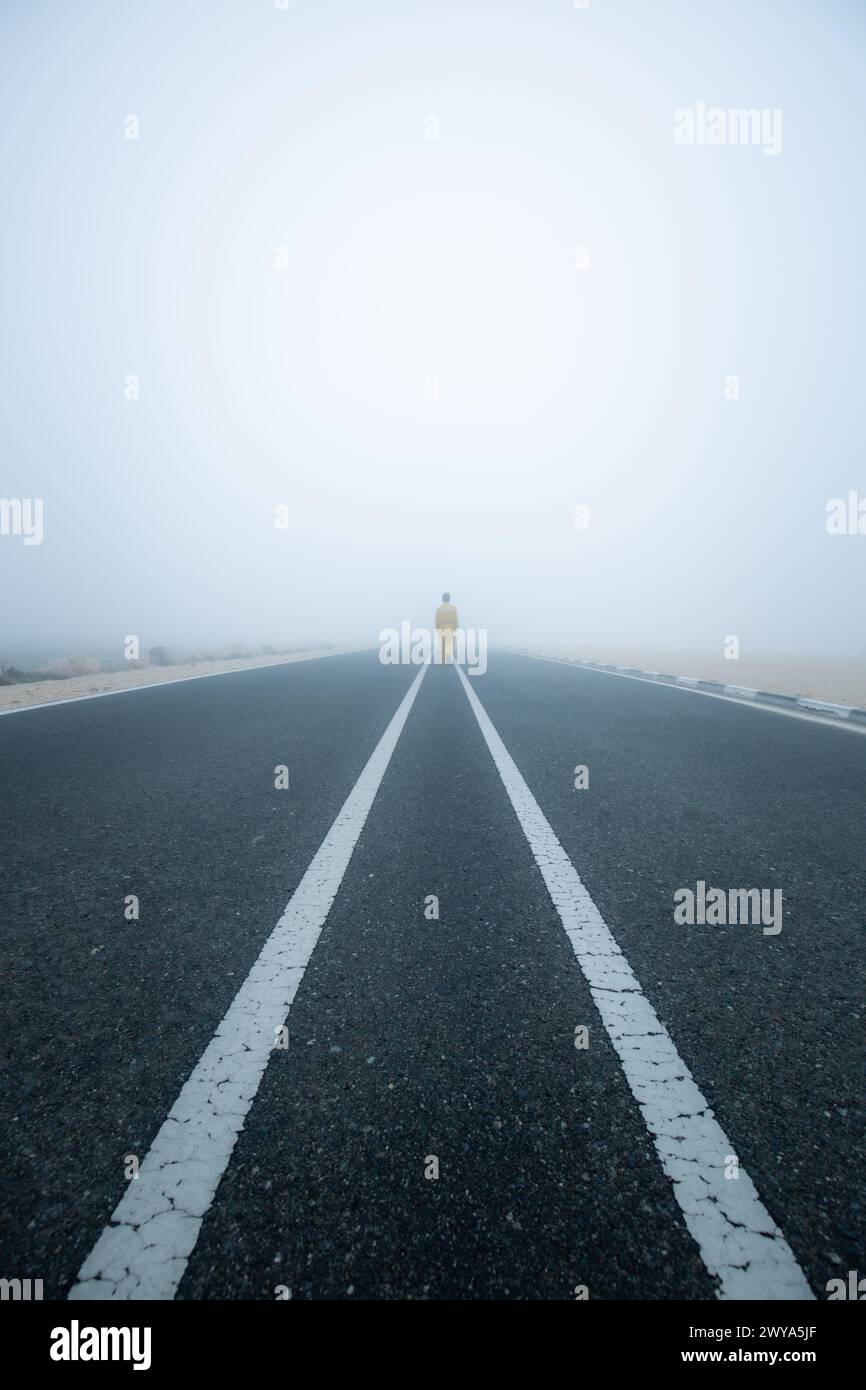 One person walking hi-res stock photography and images - Alamy