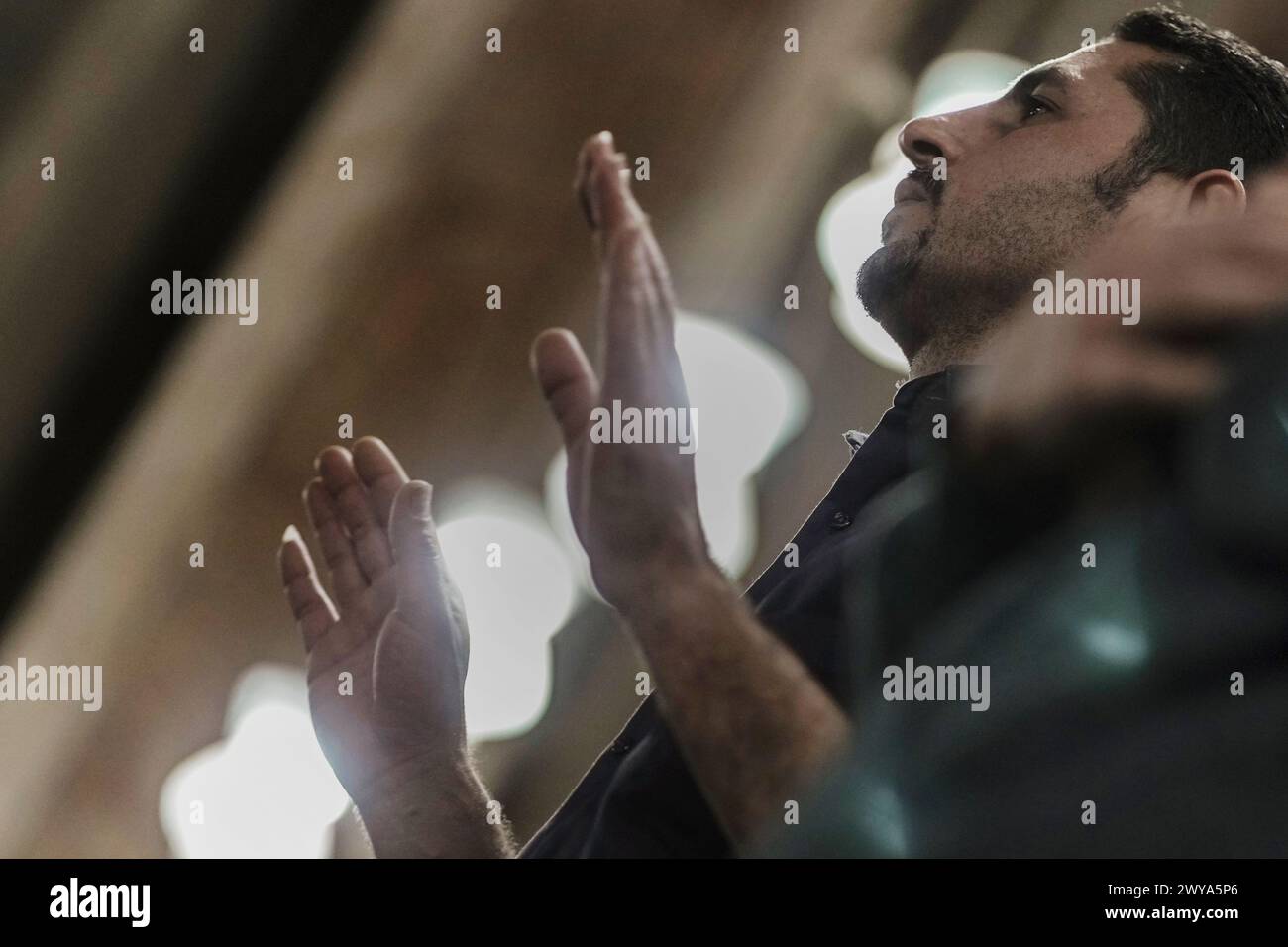 A Muslim worshipper prays during the Muslim holy fasting month of ...