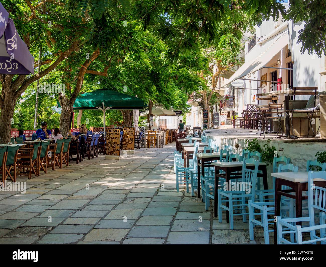 Street of Apeiranthos Village and cafe tables, Naxos Island, Cyclades ...