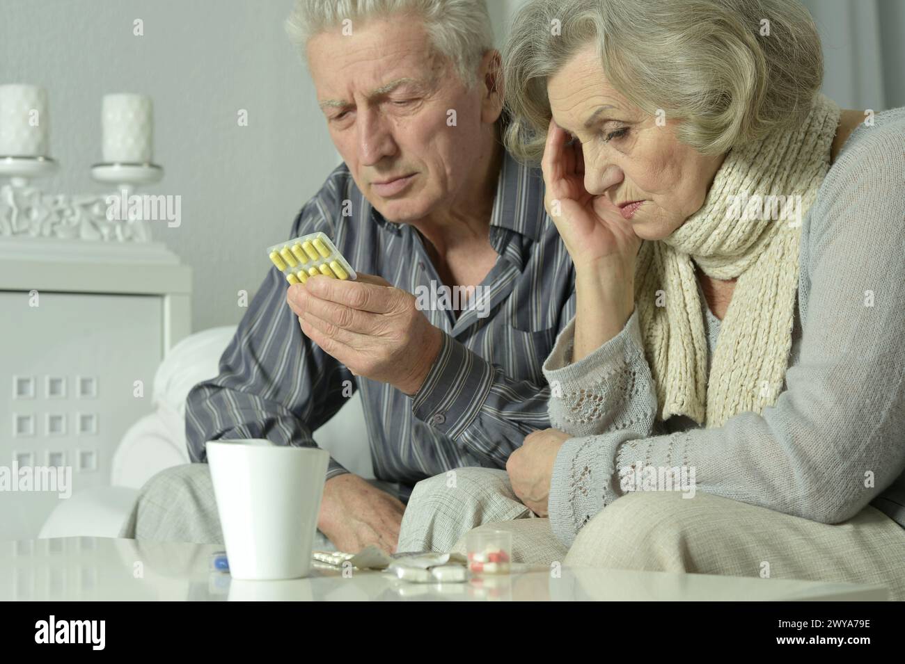Close up portrait of sick senior man holding inhaler Stock Photo - Alamy