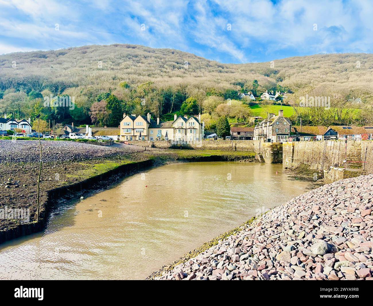 Porlock Weir Harbour as the tide goes out Stock Photo - Alamy