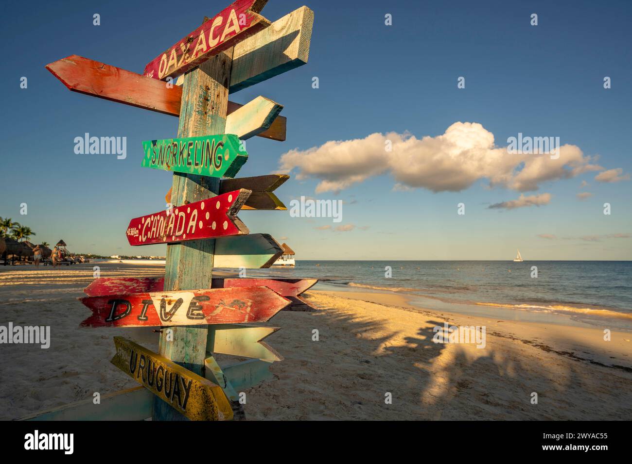 View of destination signpost near Puerto Morelos, Caribbean Coast ...