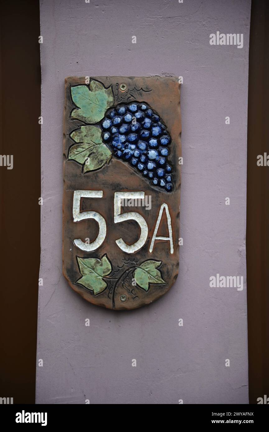 Vintage handcrafted clay street number sign in Kintzheim, Alsace France ...