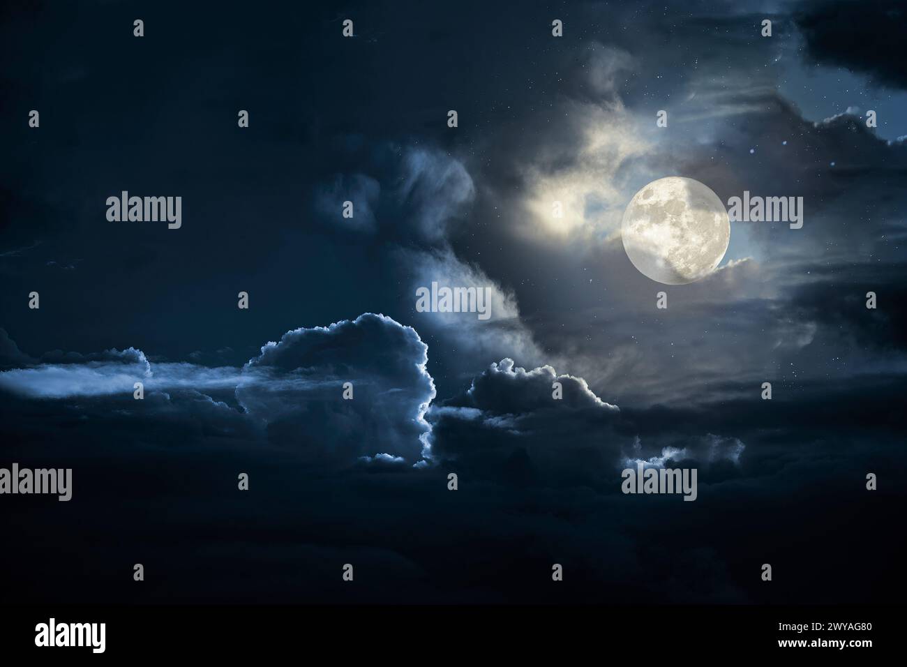 Beautiful cloudy full moon night Stock Photo - Alamy