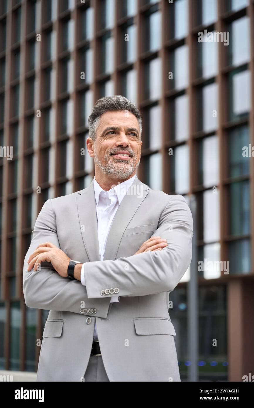 Happy mature business man leader executive thinking of future success ...