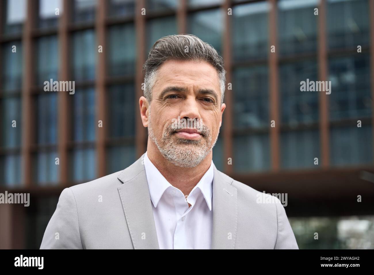 Portrait of confident rich middle aged business man outdoors, headshot ...