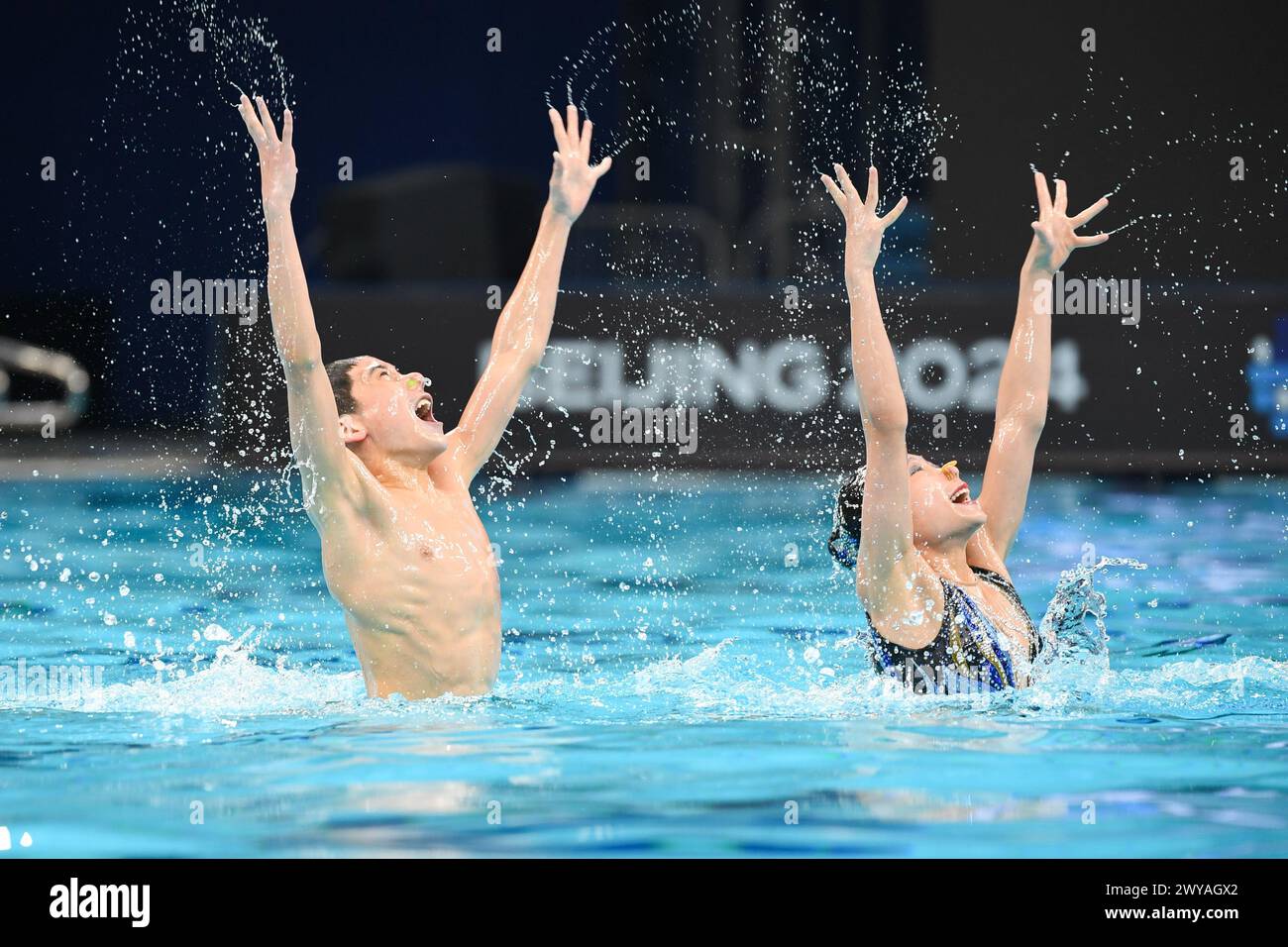 Beijing, China. 5th Apr, 2024. Ji Heyue(R)/Guo Muye of China compete ...