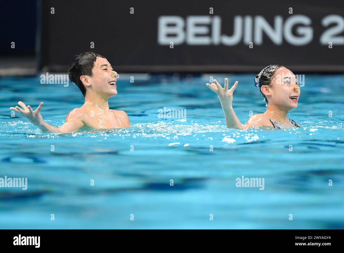 Beijing, China. 5th Apr, 2024. Ji Heyue(R)/Guo Muye of China compete ...
