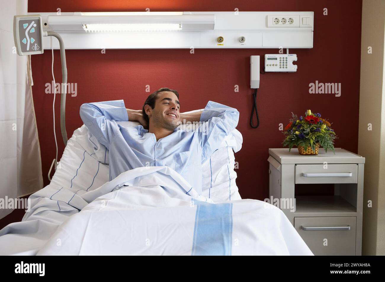 Single male patient on bed hi-res stock photography and images - Alamy