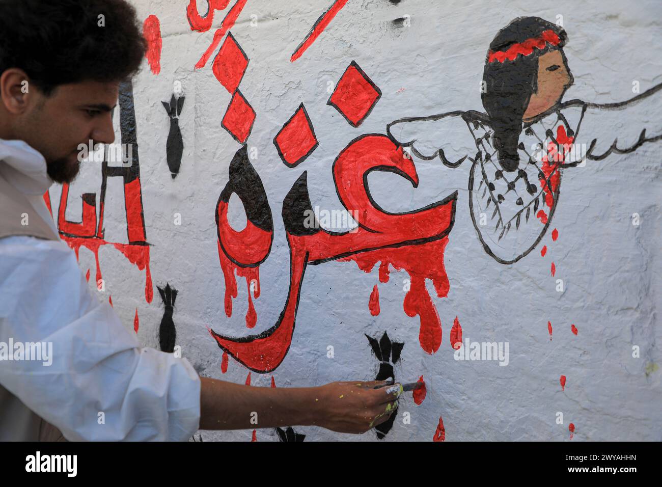 Gaza. 7th Oct, 2023. An artist paints murals depicting the war in Gaza ...