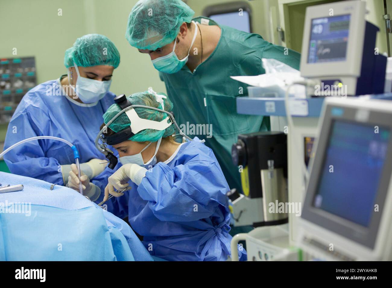 Tonsillectomy, Surgeons performing a tonsillectomy tonsil removal ...