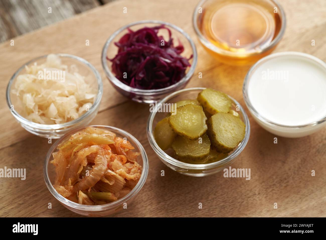 Selection of fermented foods - kimchi, white and purple sauerkraut ...