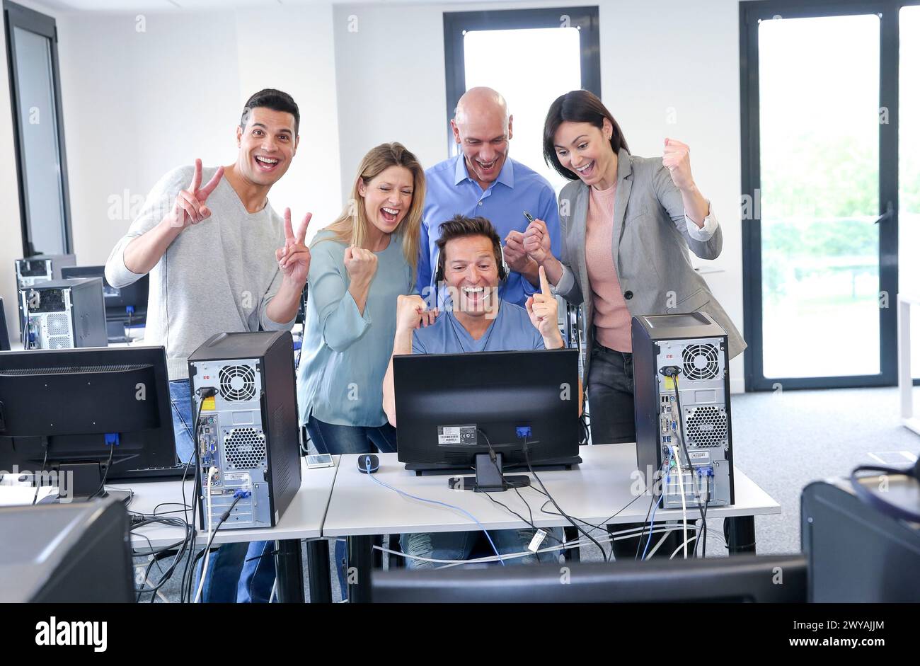 Team teachers. Computer Academy Stock Photo - Alamy