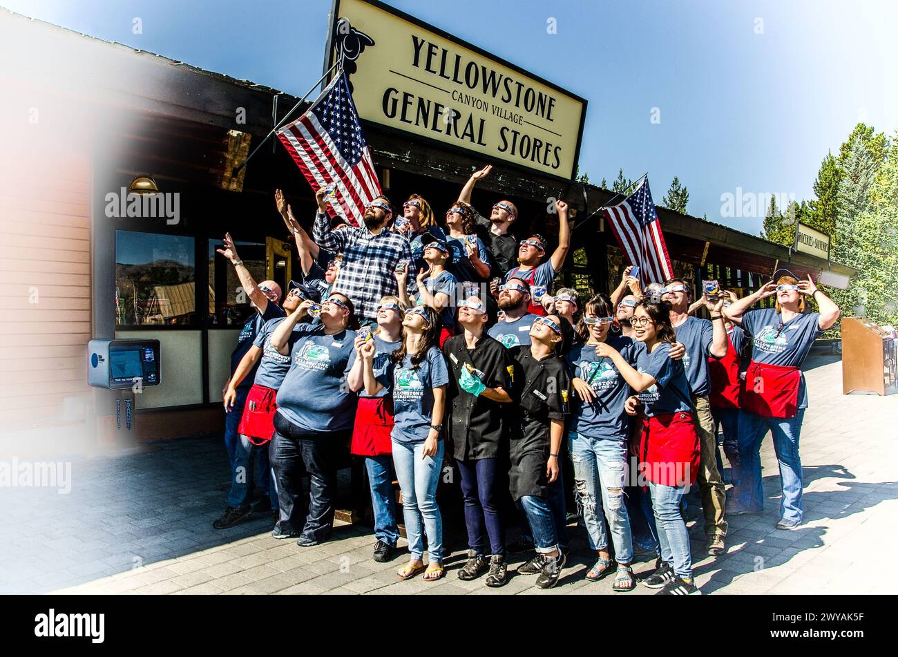 Group of people viewing a solar eclipse with glasses in Yellowstone ...