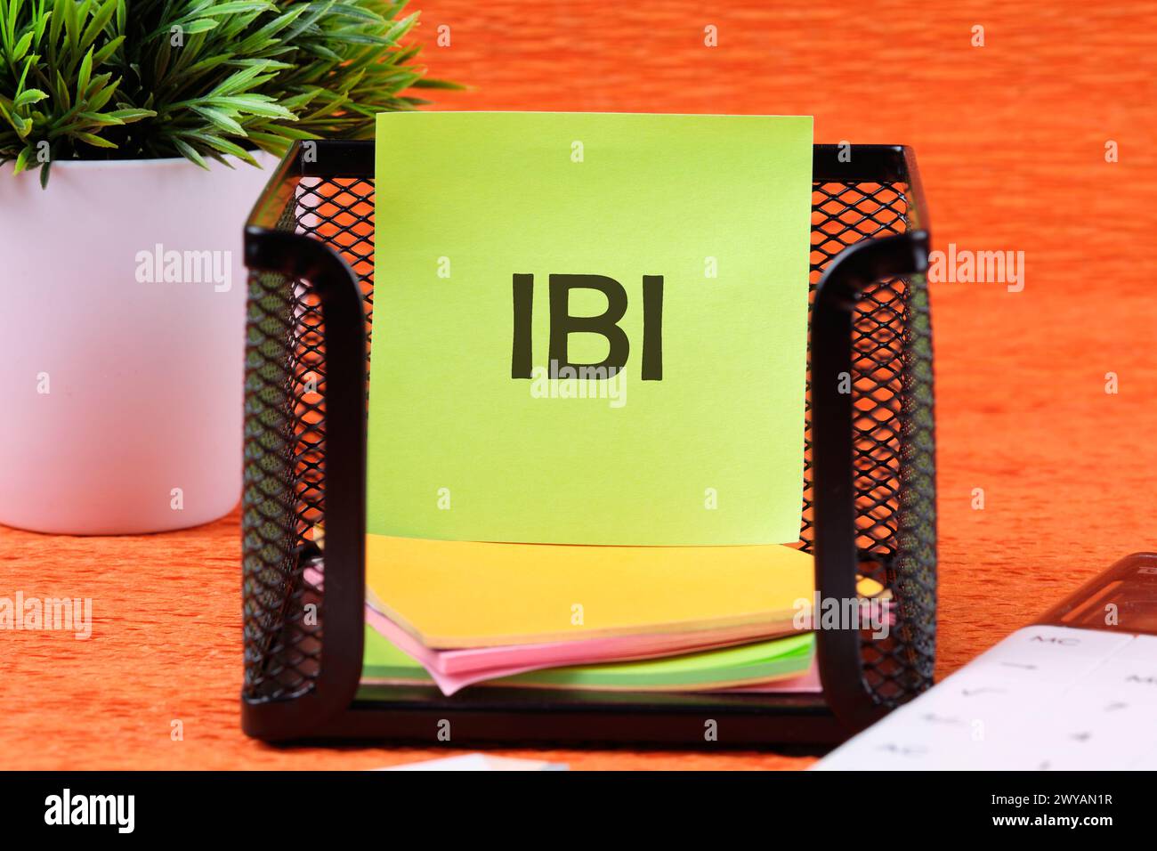 IBI symbol on a sticker in a stand on an orange background Stock Photo ...