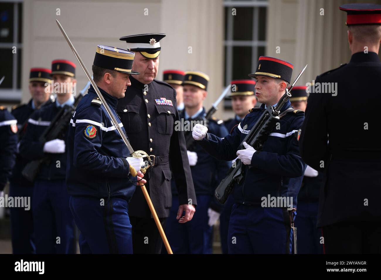 Personnel from the Gendarmerie's Garde Republicaine and the British ...