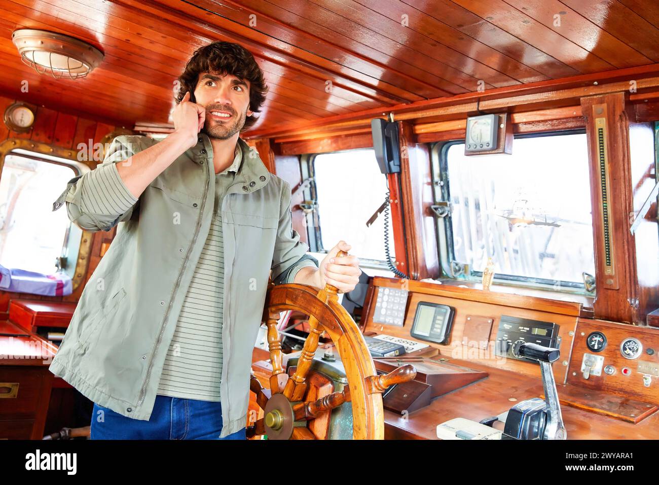 Sailor at the helm of a sailboat, galleon. Basque Country. Spain Stock ...