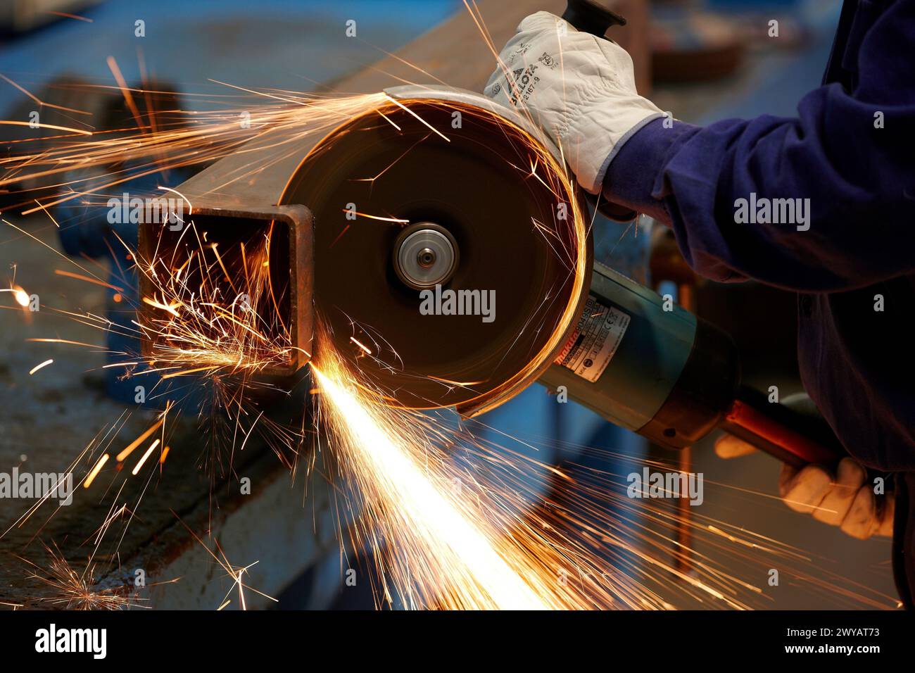 Cutting square hollow steel section, grinding machine with abrasive ...