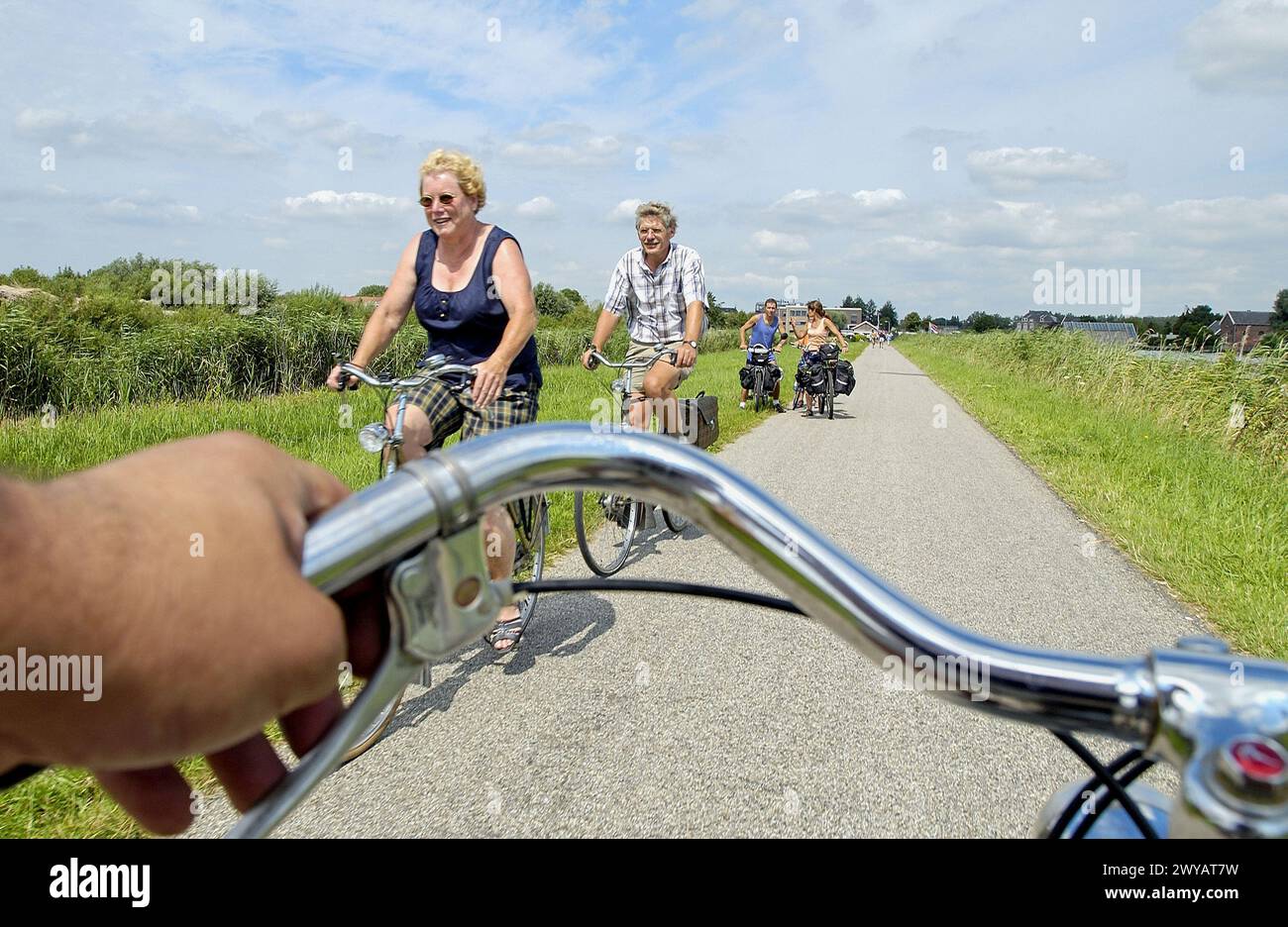 Senior citizens riding bicycles hi-res stock photography and images - Alamy