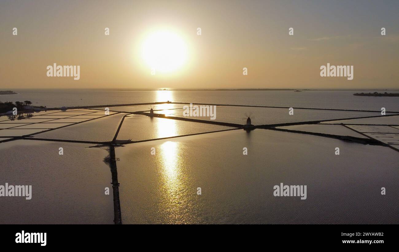 aerial view of the Stagnone salt pans and the ancient windmills at ...