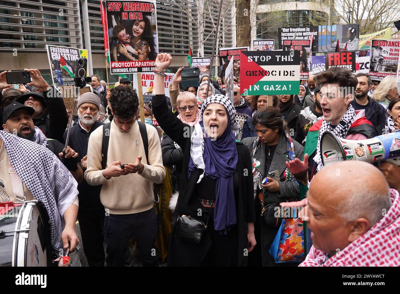 Demonstrators march through London, during an Al-Quds Day rally ...