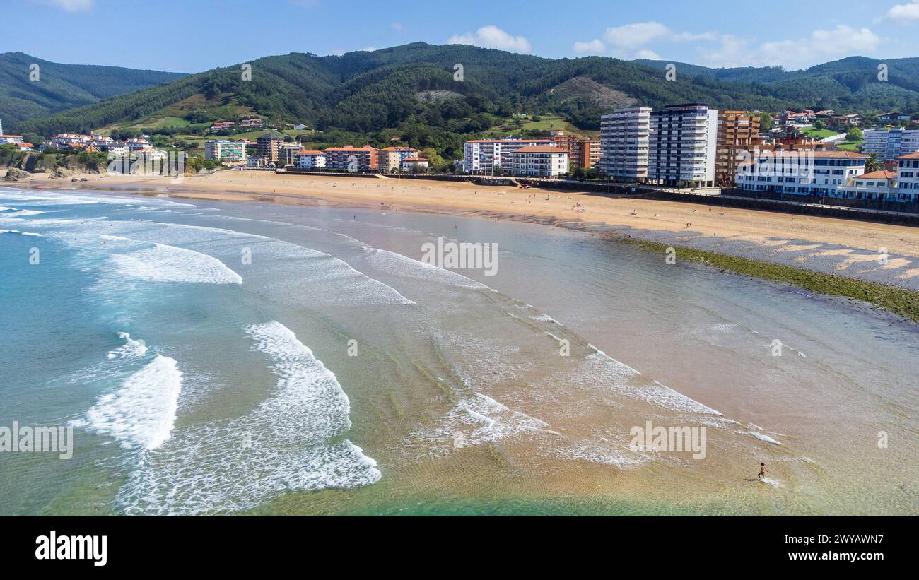Aerial view of Bakio Beach, the waters of the Cantabrian Sea with ...