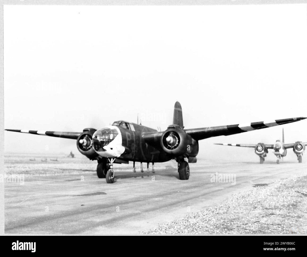 Two Wright R-2600 A.5 BO aircraft engines are shown in a photographic ...