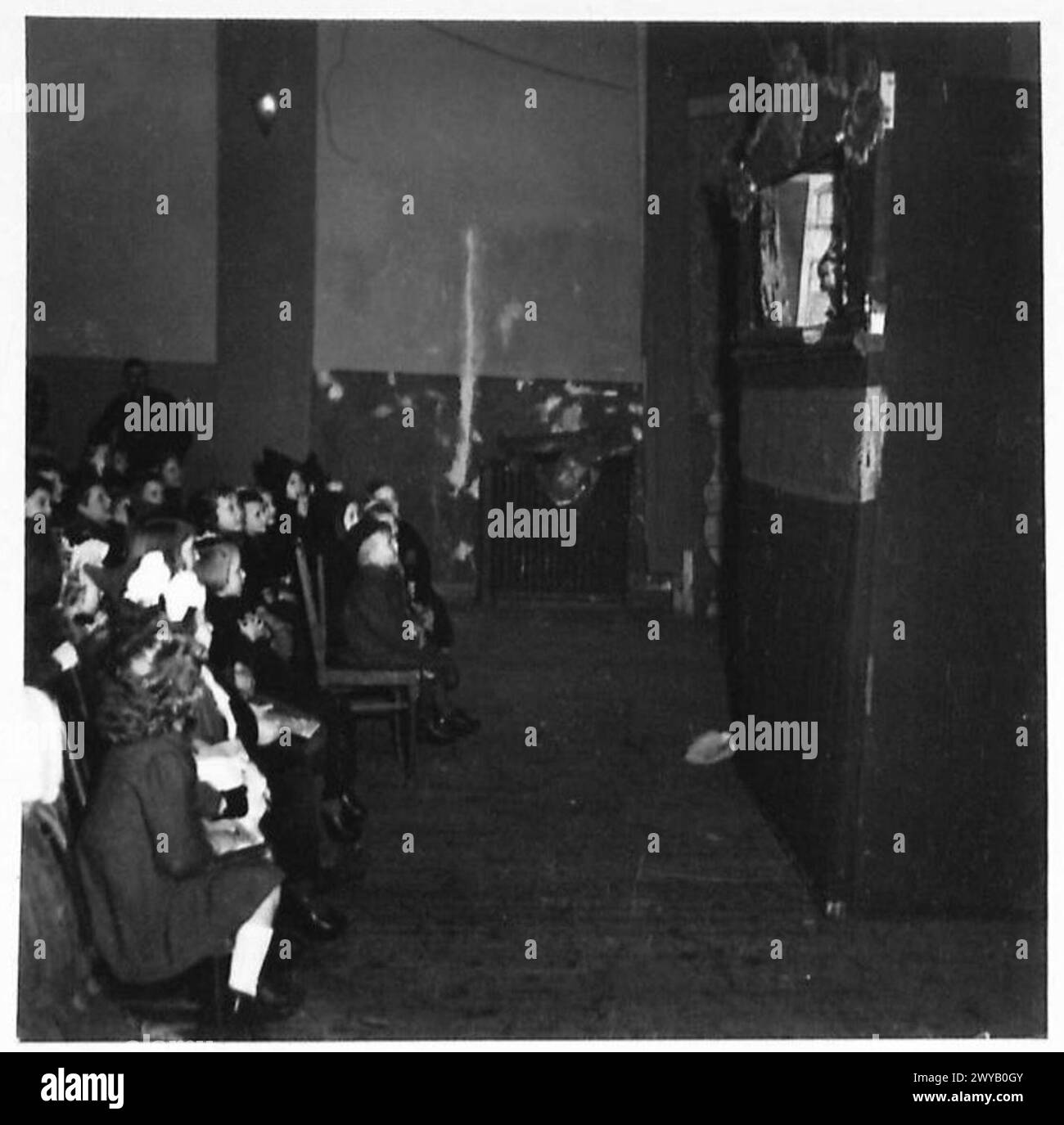 TROOPS GOODWILL PARTY TO DUTCH CHILDREN - Original wartime caption: The ...