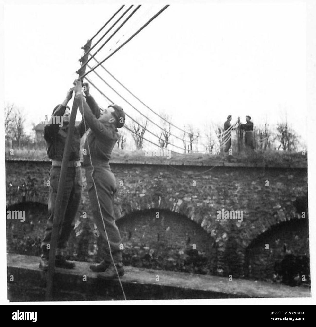 Signalmen construct communication lines across the moat at Fort Certa ...
