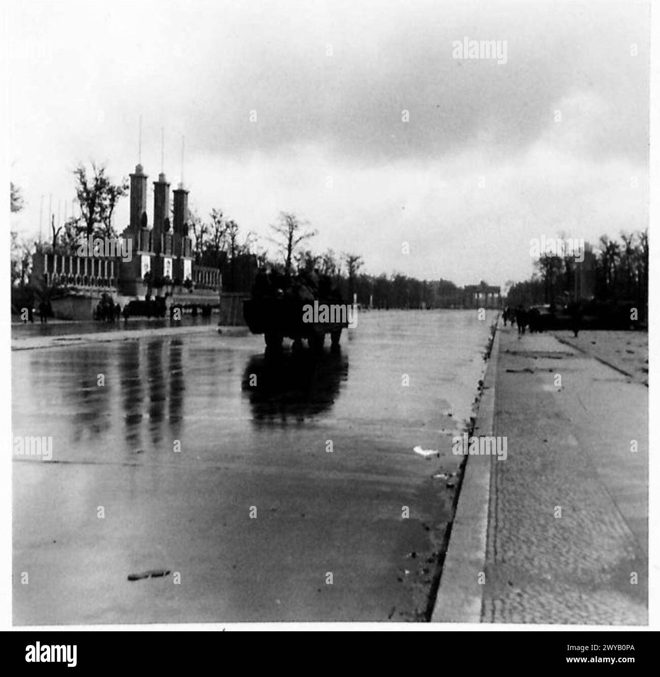 BERLIN TODAY - Original wartime caption: Russin woldier in a DUKW ...