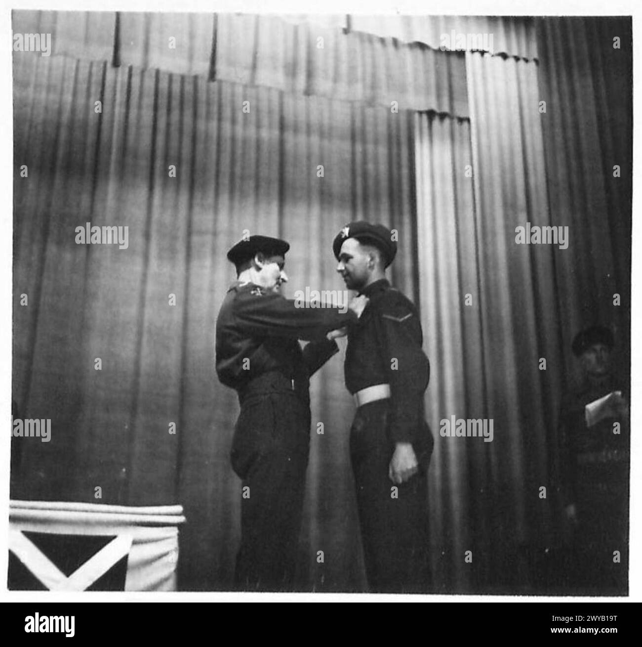 INVESTITURE 12 Corps Troops - Original wartime caption: L/Bdr. A.E ...