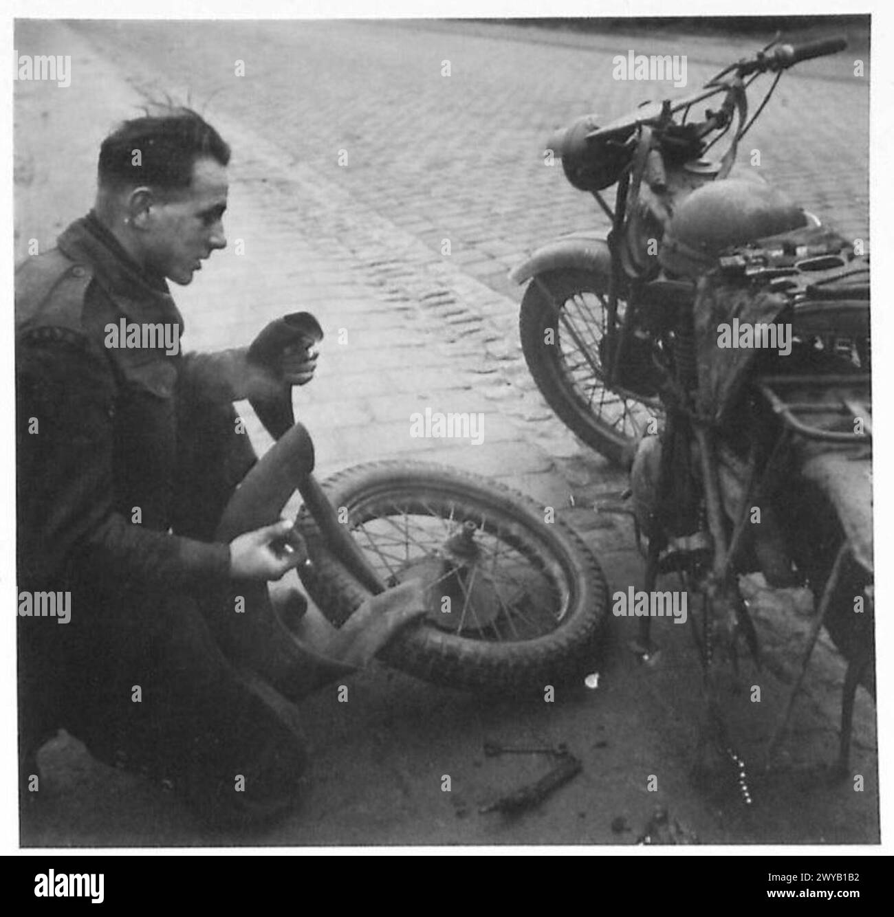 A DESPATCH RIDER'S JOURNEY IN HOLLAND - Original wartime caption: It is ...