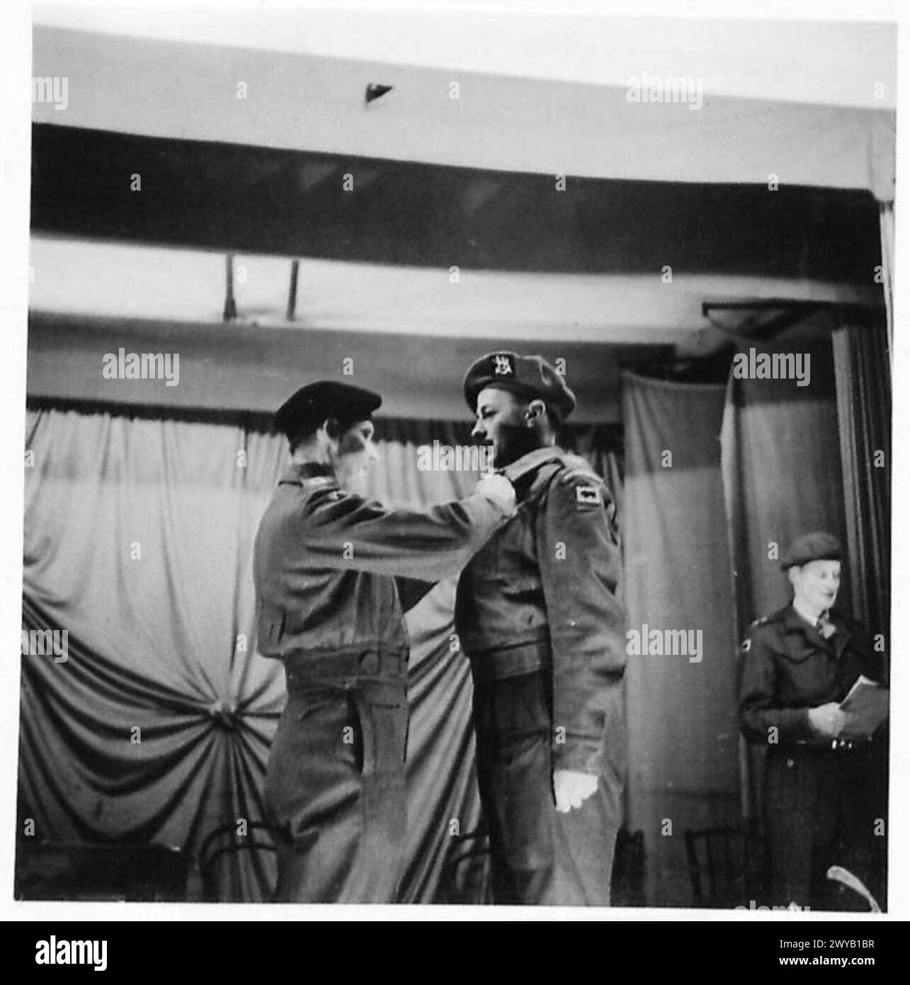 11th ARMOURED DIV INVESTITURE - Original wartime caption: Lt-Col G.R ...
