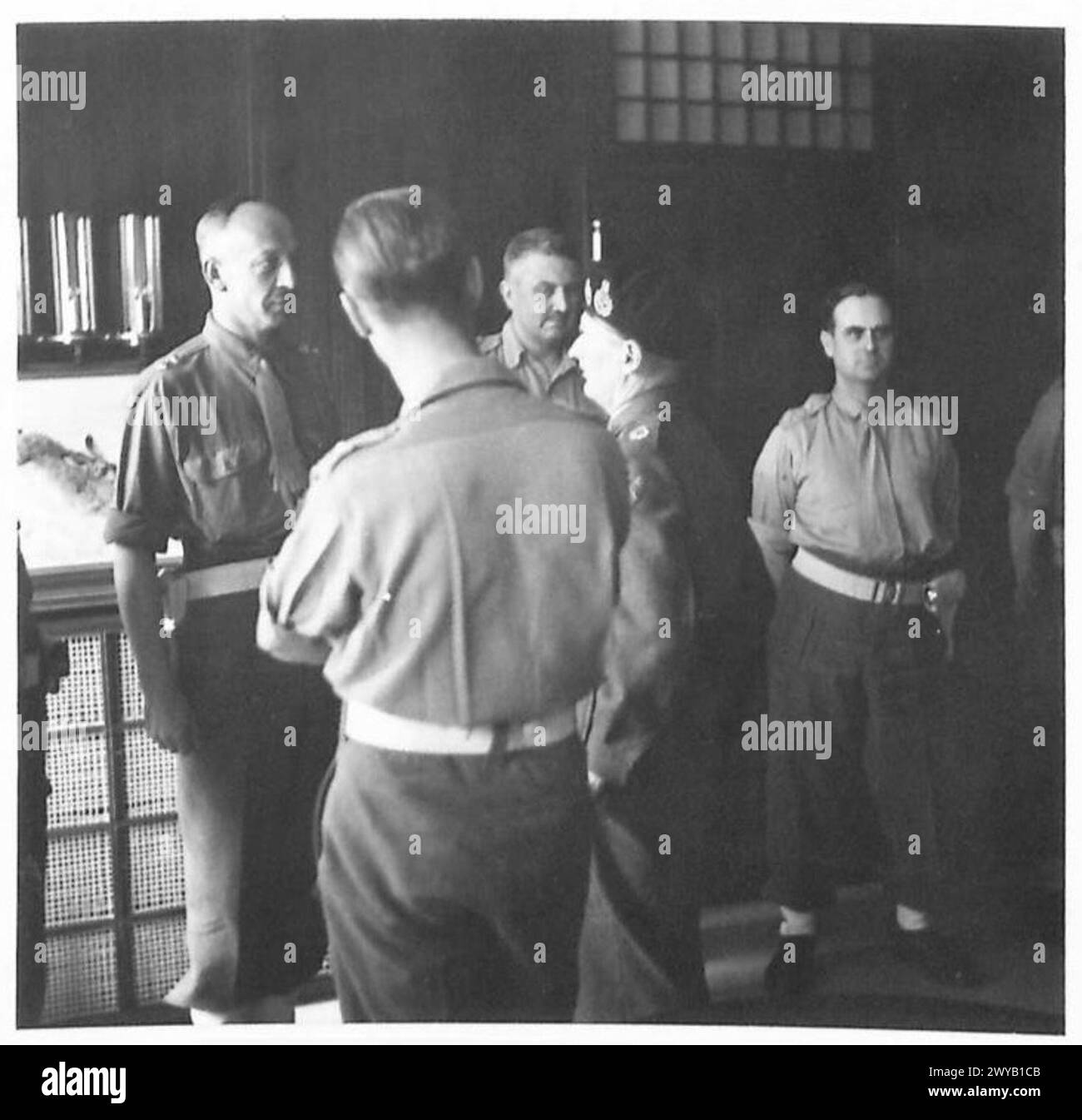 C-IN-C VISITS 5 DIVISION - Original wartime caption: The C-in-C ...