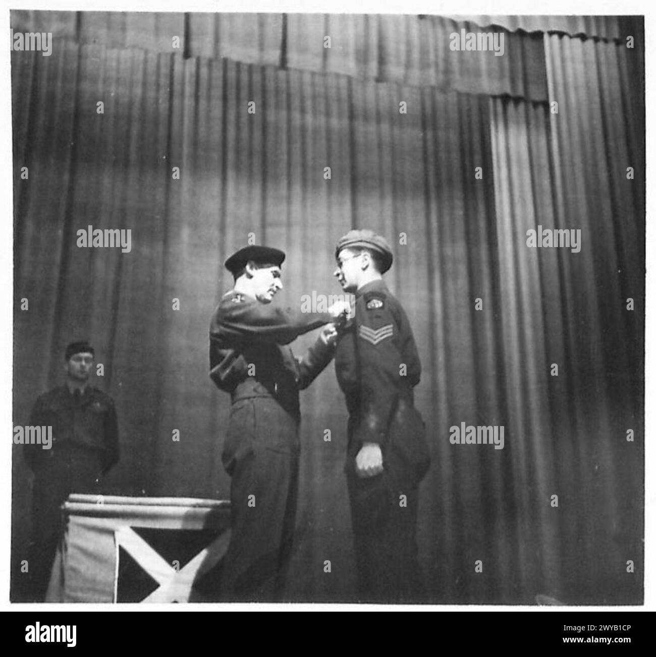 INVESTITURE 12 Corps Troops - Original wartime caption: L/Sjt S.J ...