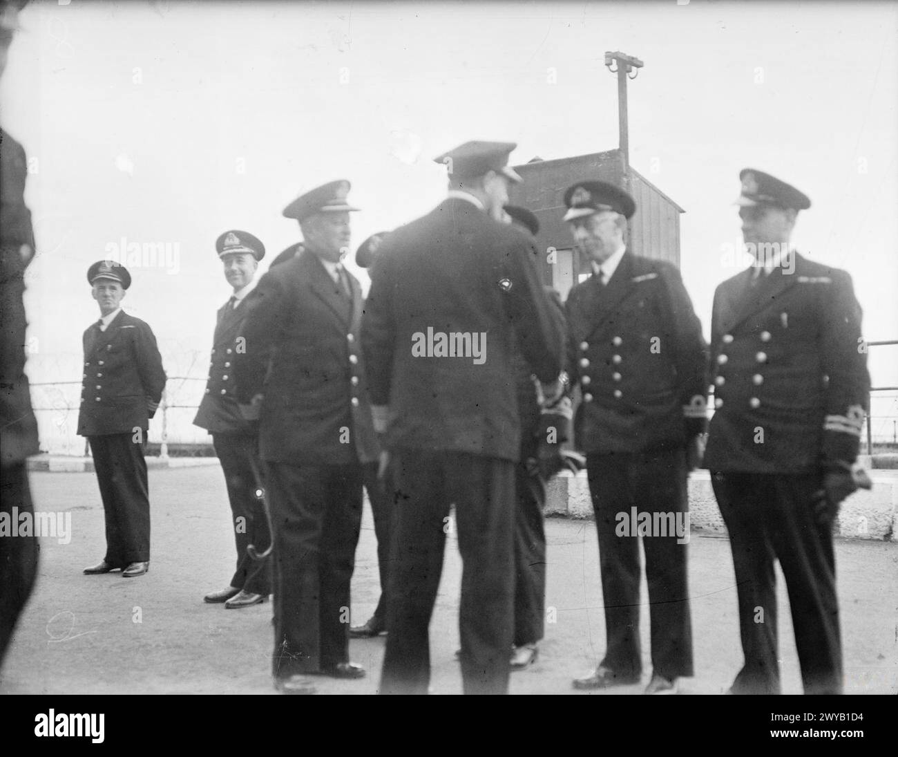 Vice Admiral Holt, FOIC Humber, visits the Grimsby naval base in 1940 ...