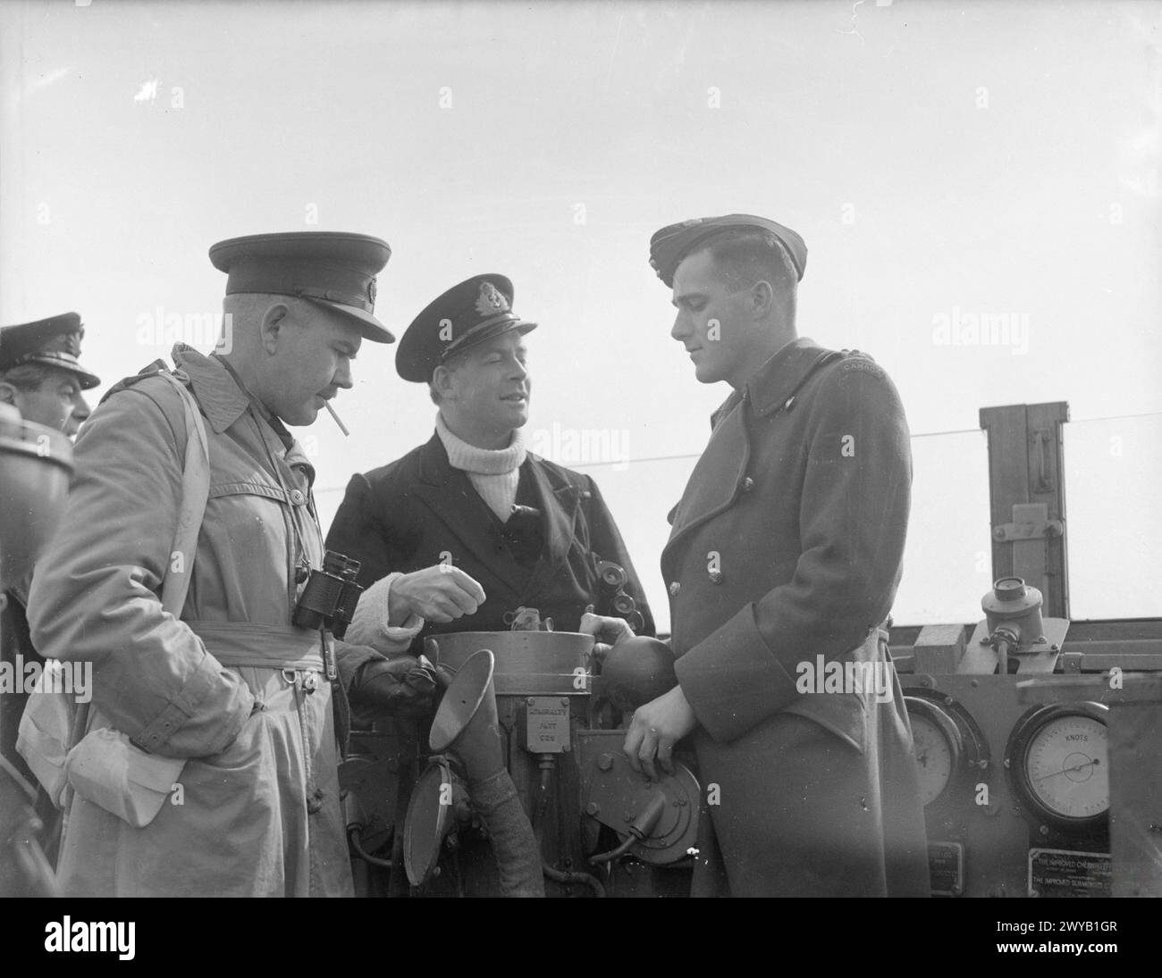 Army officers visit HMS Mackay destroyer in 1941 and confer with the ...