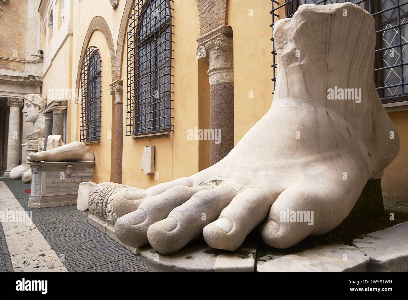 Remains of statue of Emperor Constantine II at courtyard of Palazzo dei ...