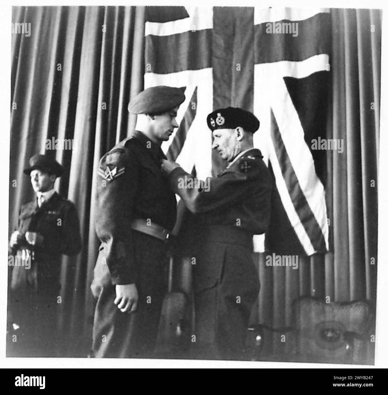 M.M. - Original wartime caption: Bombadier L.E. Crane 81 Fd.Regt ...