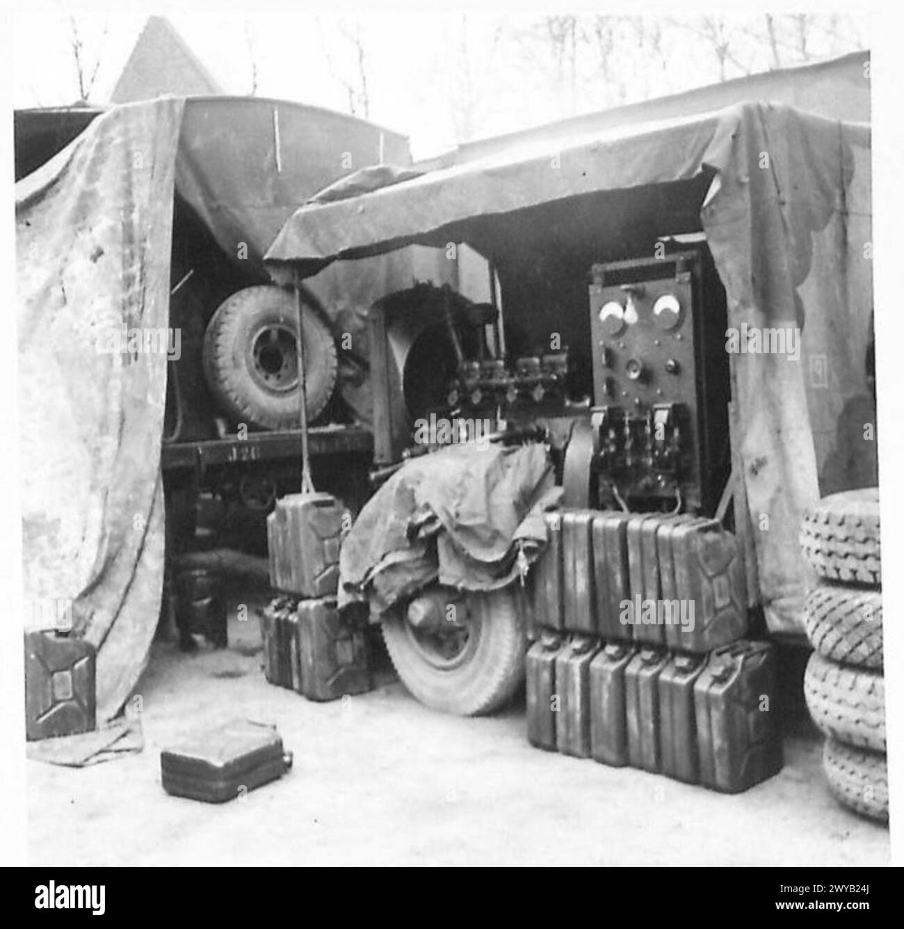 Major Hamilton and Mr. Kent converse with staff at a mobile laundry ...