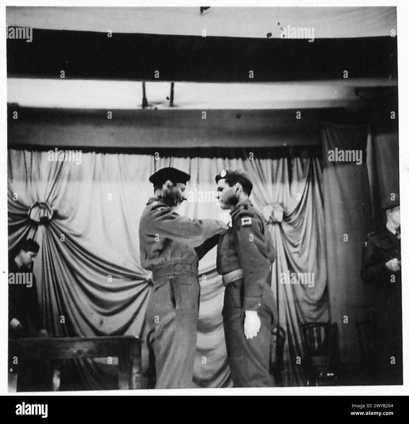 Lieutenant E.R.C. Yetman of 8th Rifle Brigade receives the Military ...