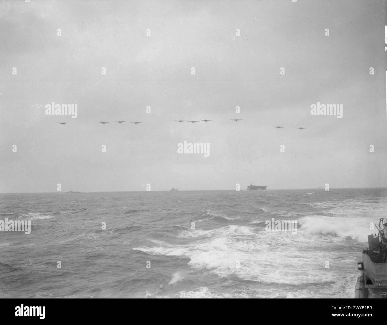 Fairey Barracuda naval torpedo bombers fly in formation over HMS ...