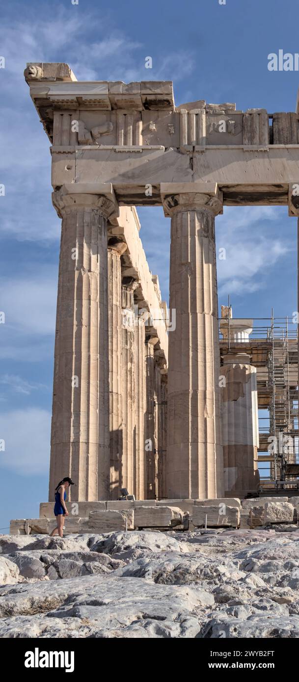 Tourists walk around the Parthenon at the ruins of the Acropolis in Athens Greece Stock Photo ...