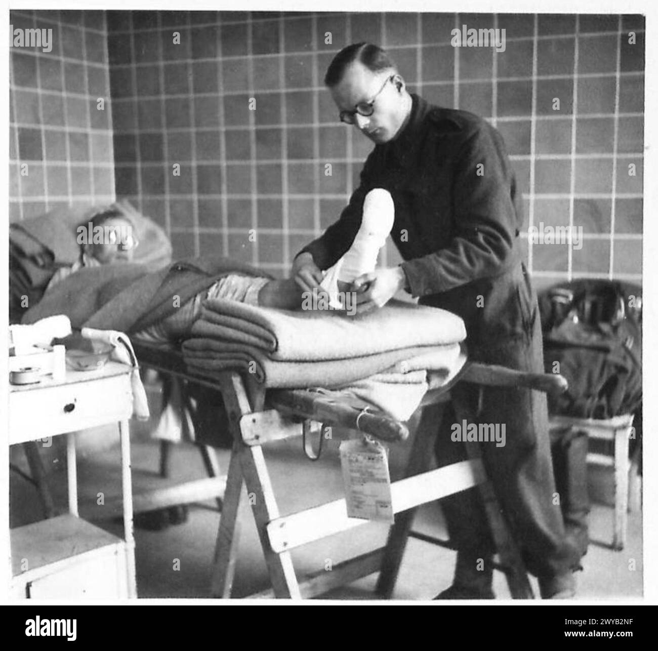 PS. C W - Original wartime caption: Bad case of trench feet in the M.I ...