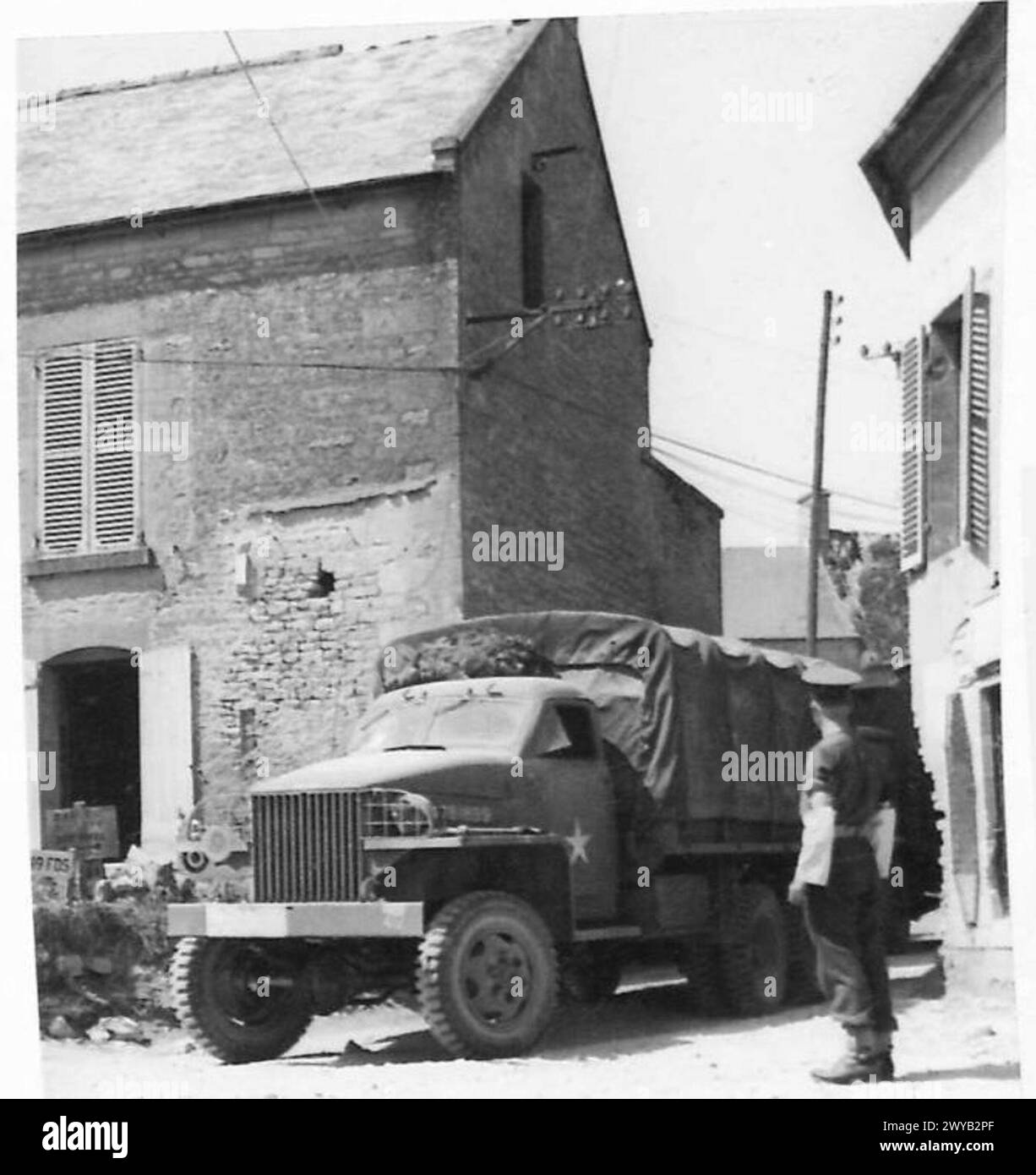TRAFFIC IN NORMANDY - Original wartime caption: A military policeman ...